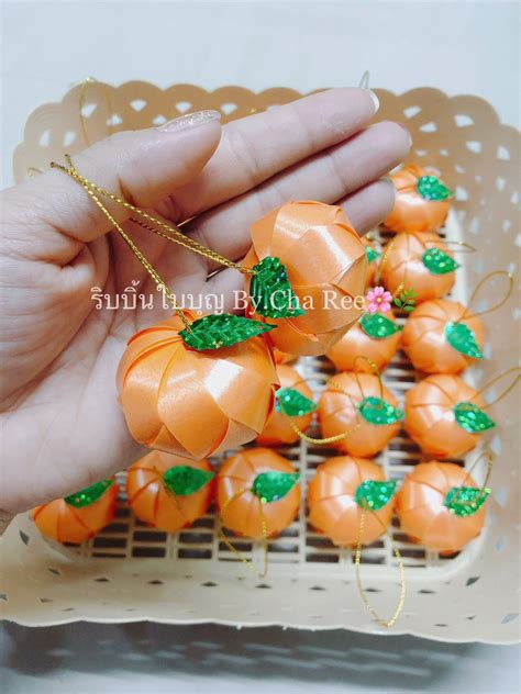 เหรียญโปรยทานงานบวช งานบุญต่างๆราคาถูก ร้านริบบิ้นใบบุญ