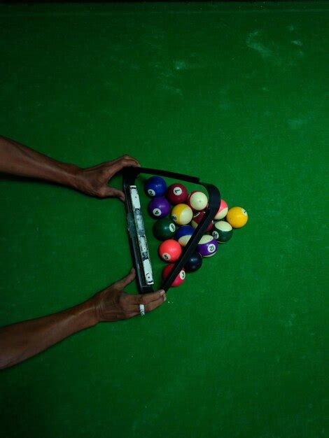 Premium Photo Cropped Hands Adjusting Balls On Pool Table