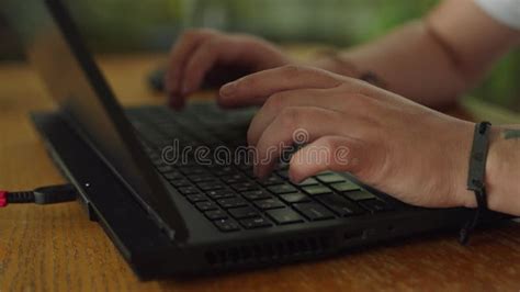 Close Up Of Coders Hands Typing On Laptop Programming In A Tech