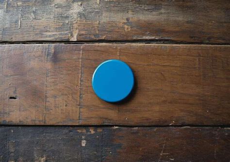 Download Versatile Blue Button On Wooden Table Mockups Online