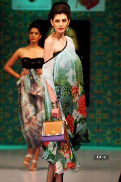 Model Displays A Design During A Fashion Show Held As Part Of The 7th