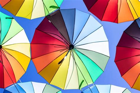 Premium Photo Colorful Umbrellas Blue Green Red Rainbow Umbrellas