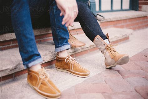 Couple Sitting By Stocksy Contributor Luke Mallory Leasure Stocksy