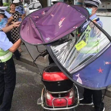 永安人，自觉拆除电动车遮阳伞（篷），我们一起来行动文明小吉风险