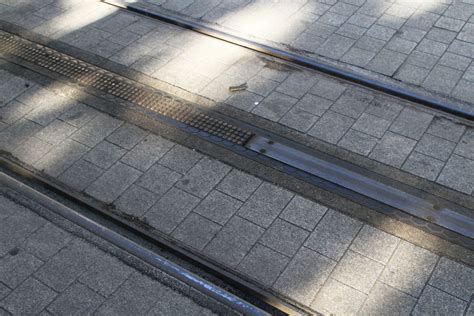 Transition Between Conductive And Insulated Sections Of The Aps Ground Level Power Rail At Town