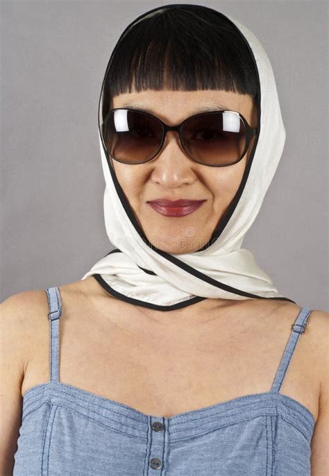 Asian Woman Wearing Sunglasses And Silk Scarf Royalty Free Stock