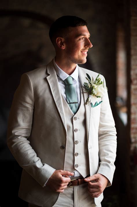 Groom Wearing A Beige Suit With A Sage Green Tie Kingston Country