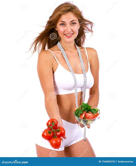 Mujer Rubia Hermosa En La Ropa Blanca De La Aptitud Foto De Archivo