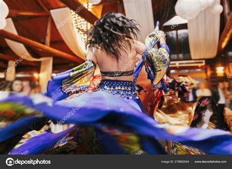 Beautiful Gypsy Girls Dancing In Traditional Blue Floral Dress A Stock