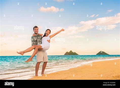 Happy Honeymoon Couple On Beach Wedding Vacation Newlyweds Excited In