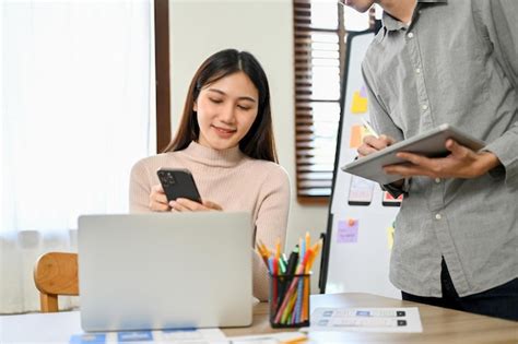 Premium Photo Professional Asian Female Developers Working With Her