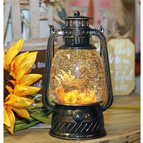 Cornucopia Lantern Snow Globe The Music Box Company