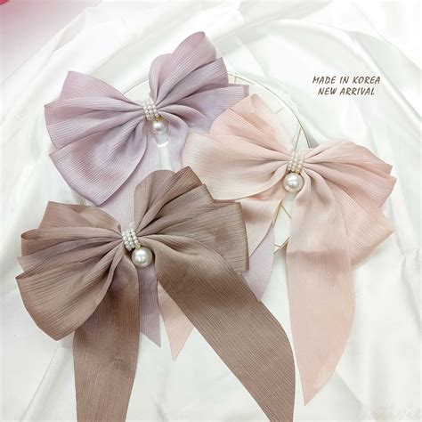 韓國 大地色 珍珠 緞帶 造型 蝴蝶結 彈簧夾 產品介紹 黛德美飾品百貨 批發零售 萬種日韓商品天天有新貨30年的服務熱誠