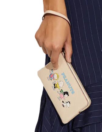 Coach Coach X Peanuts Corner Zip Wristlet With Snoopy And Friends Motif
