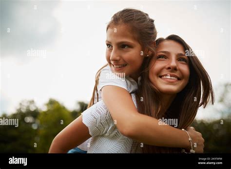 Sisters Are There To Support One Another A Young Girl Giving Her