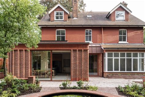 Cast Corbel House By Grafted Features Handcrafted Red Concrete Details
