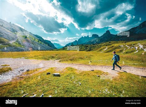 Description Young Sportive Woman Walks Along Scenic Dolomites High