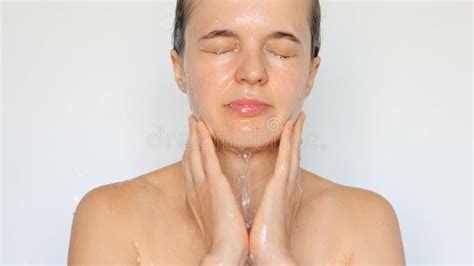 Beautiful Young Woman Washing Her Fresh And Beautiful Face Morning