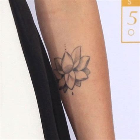 Ireland Baldwin Tattoos Steal Her Style Flower Tattoo Arm Forearm