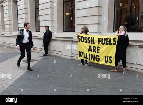 A Guest Of The Science Museum Directors Annual Dinner Walks Past