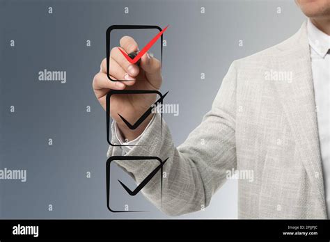 Man Pointing At Red Check Mark In Box On Virtual Screen Closeup Stock Photo Alamy