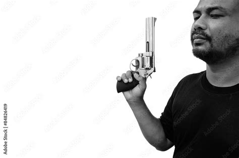 Man Standing And Hand Holding Gun Revolver Side View On Isolate White