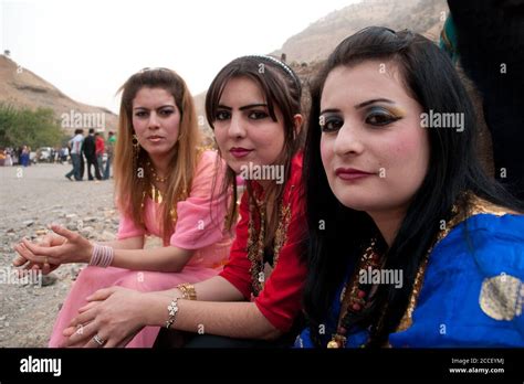 Three Young Single Kurdish Woman In Traditional Clothes At A Wedding In