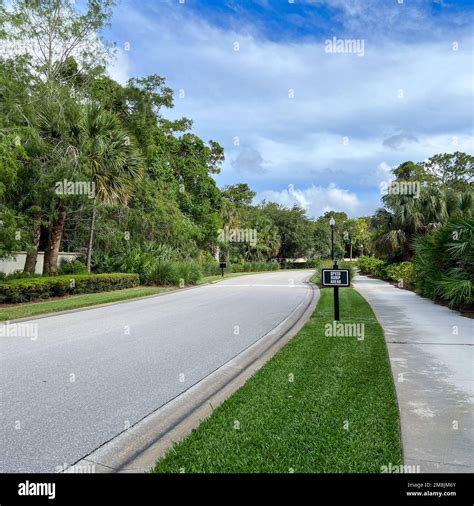 A Speed Bump Ahead Sign In A Neighborhood Used To Slow Down Cars On