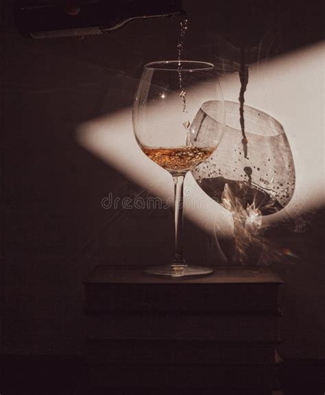 A Glass Of Wine On A Stack Of Books Stock Image Image Of Light Books 180274217