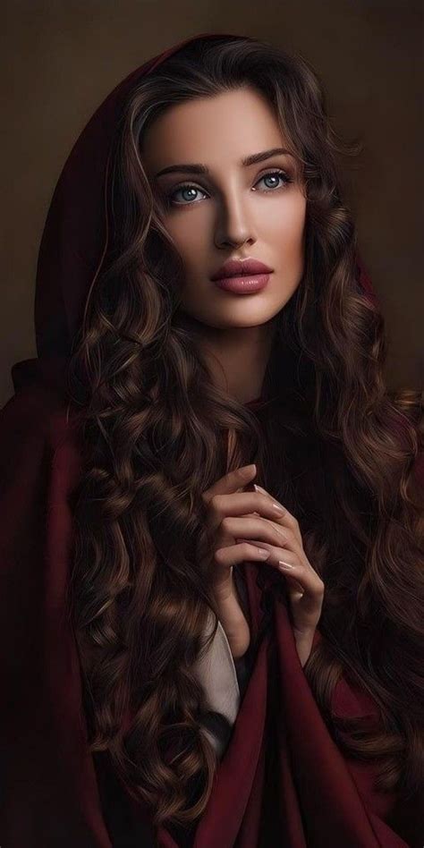A Woman With Long Brown Hair Wearing A Red Shawl And Holding Her Hands