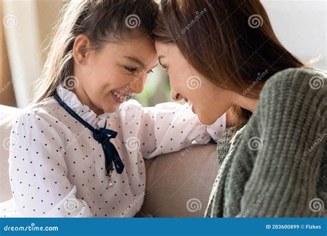 Happy Mom And Daughter Have Tender Intimate Moment Together Stock Image