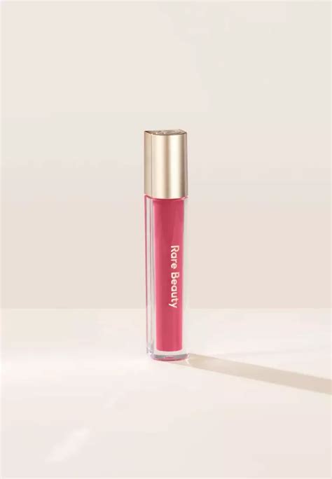 Buy Rare Beauty Stay Vulnerable Glossy Lip Balm In Nearly Rose 2024