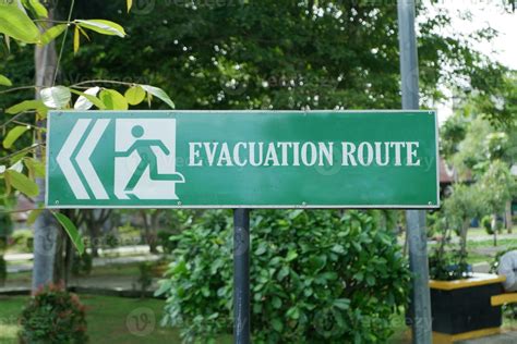 evacuation route warning boards in the park area directions for