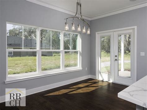 Dining Area Showing Minka Group Lighting Fixture Custom Homes Home