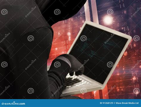 Black Jumper Hacker With Out Face Sit With The Computer Server