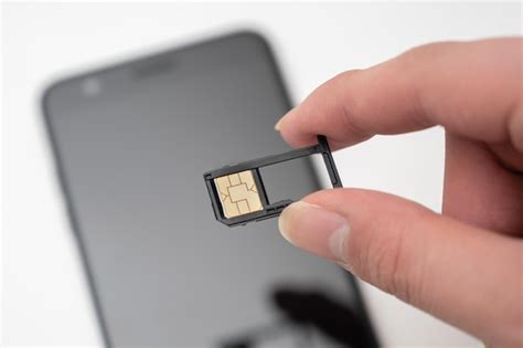 Premium Photo Sim Card Replacement In The Phone Mobile Simcard