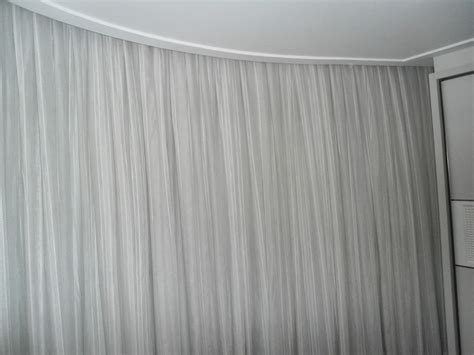 URSULA CORTINAS E DECORAÇÕES Cortinas em janelas curvas
