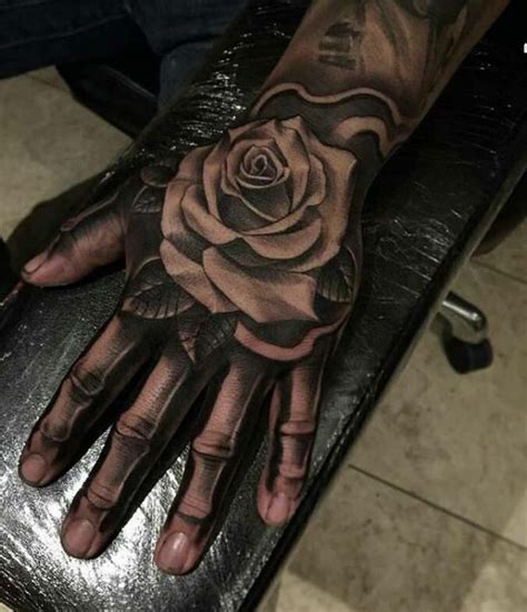 Rose On Skeleton Hand Skull Hand Tattoo Bone Hand Tattoo Rose Hand