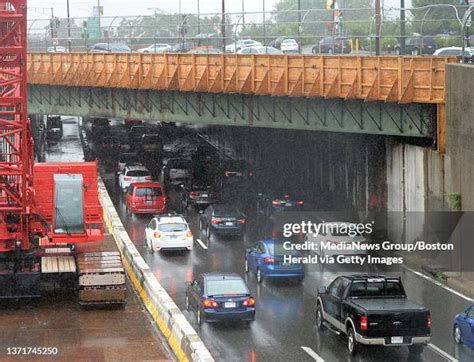 Westbound Traffic On The Massachusetts Turnpike Passes Under The