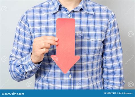 Man With Arrow Pointing To The Down Stock Photo Image Of Marketing Paper