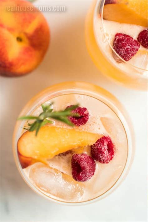 Easy Rosemary Peach Tequila Punch Recipe So Delicious