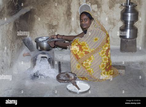 Woman Cooking In Kitchen Gond Tribe Gadchiroli Maharashtra India