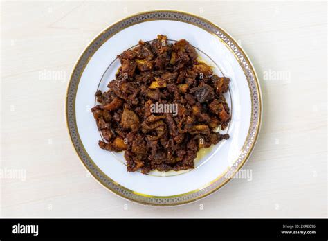 Tasty Bangladeshi Food Gorur Bot Bhaja Or Gorur Vuri Bhuna In A White