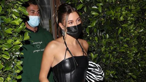 Hailey Baldwin Wears Leather Corset And Pants For Dinner Photo