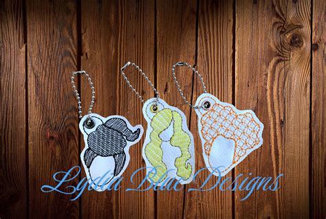 Sister Witches Set Of Three Key Chains Red Yellow Black