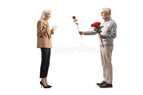 Elderly Man Giving A Red Roase To A Young Woman Stock Image Image Of