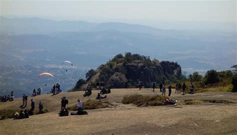 Premium Photo Tourists Admiring The View Of Atibaia City Sao Paulo Brazil From The Peak Of