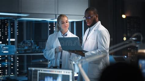 Modern Electronics Research Development Facility Engineer And Scientist Standing In High Tech