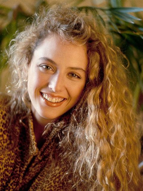 Virginia Madsen With Long Curly Hair And Leopard Print Shirt Kändisar
