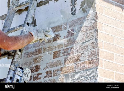 Facade Cladding With Decorative Protective Panels Of Fake Brickwork